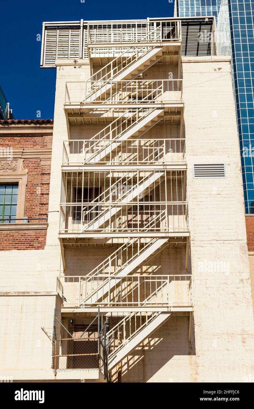 facade of historic skyscraper with fire escapre stairs Stock Photo - Alamy