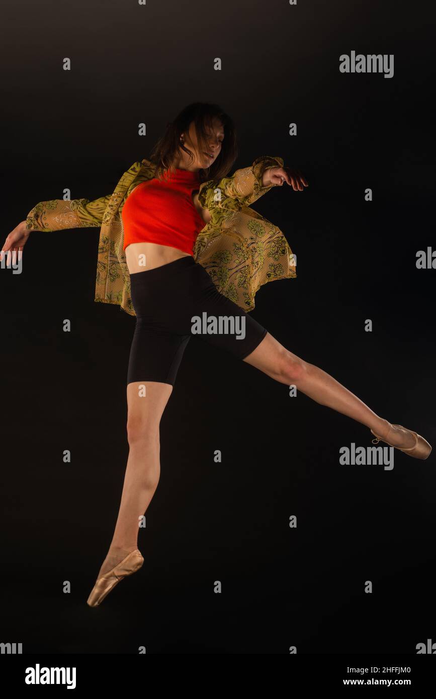 Ballerina is having a perfect posture of ballet jumps Stock Photo - Alamy