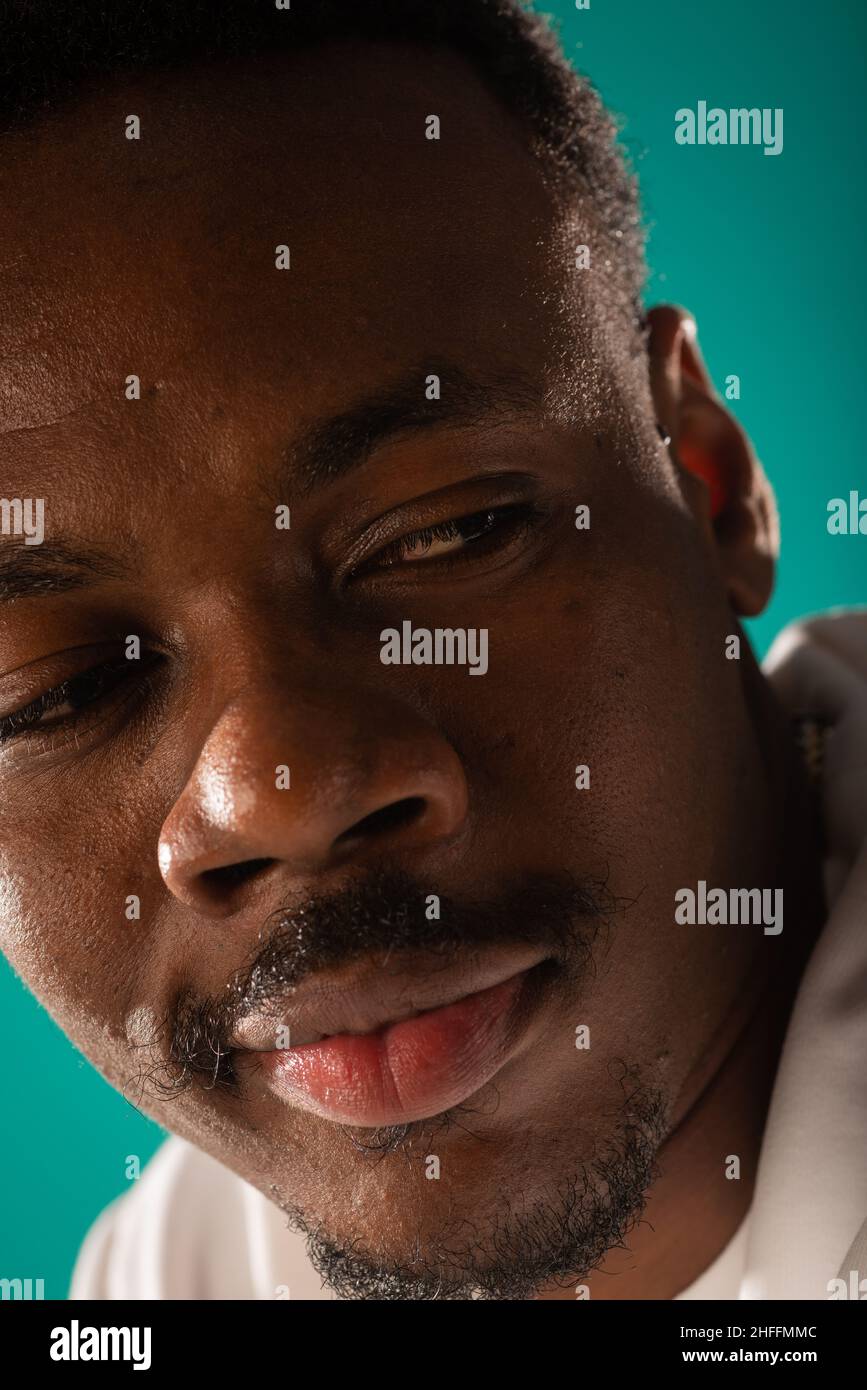 Close up portrait of african black man smiling while posing Stock Photo ...