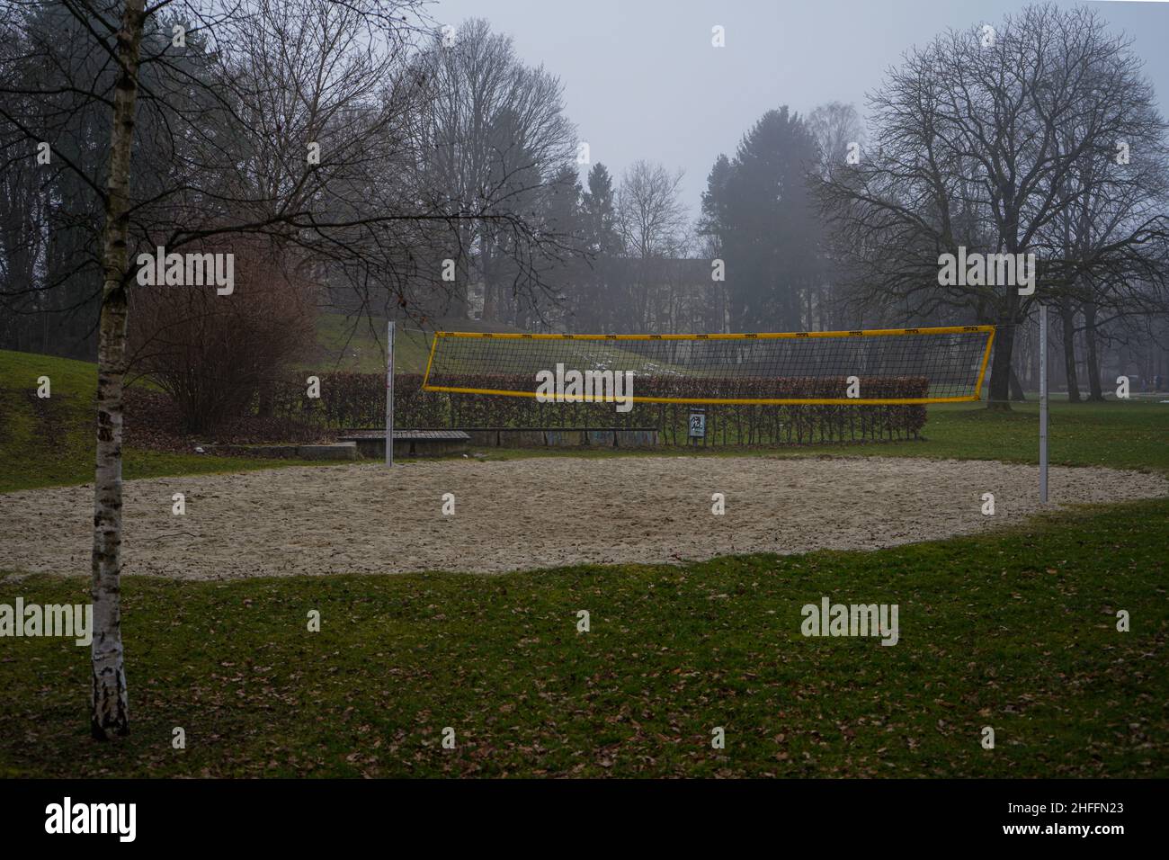 An empty volleyball court on a meadow, the net outlined in yellow Stock ...