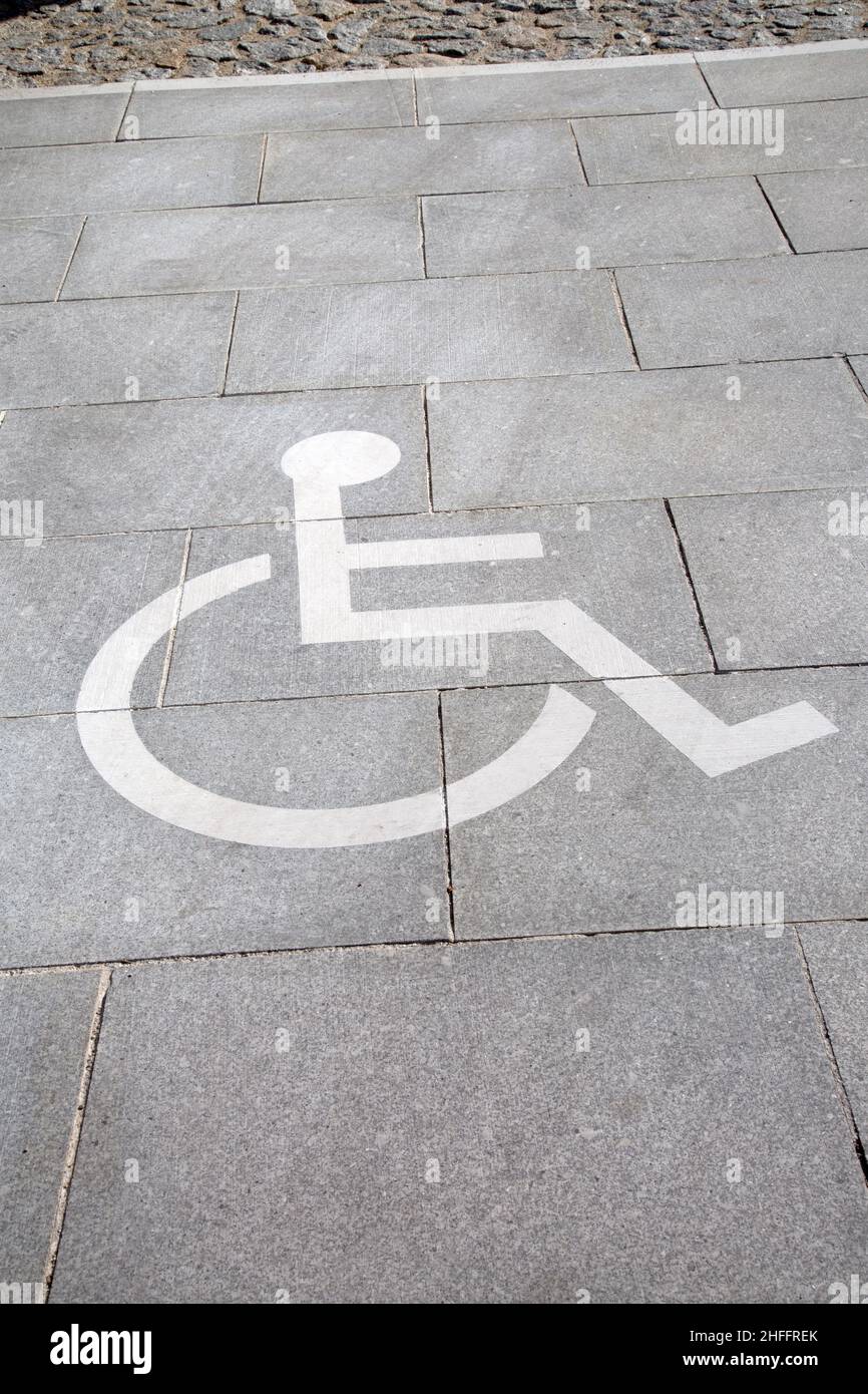 Closeup of Disabled Parking Sign on Diagonal Slant Stock Photo - Alamy