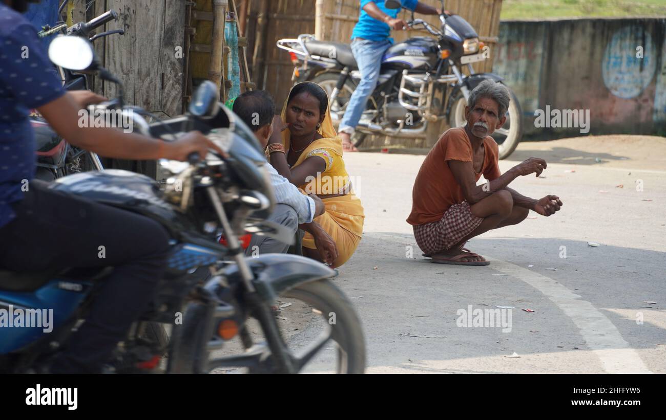Poor man sitting hi-res stock photography and images - Alamy