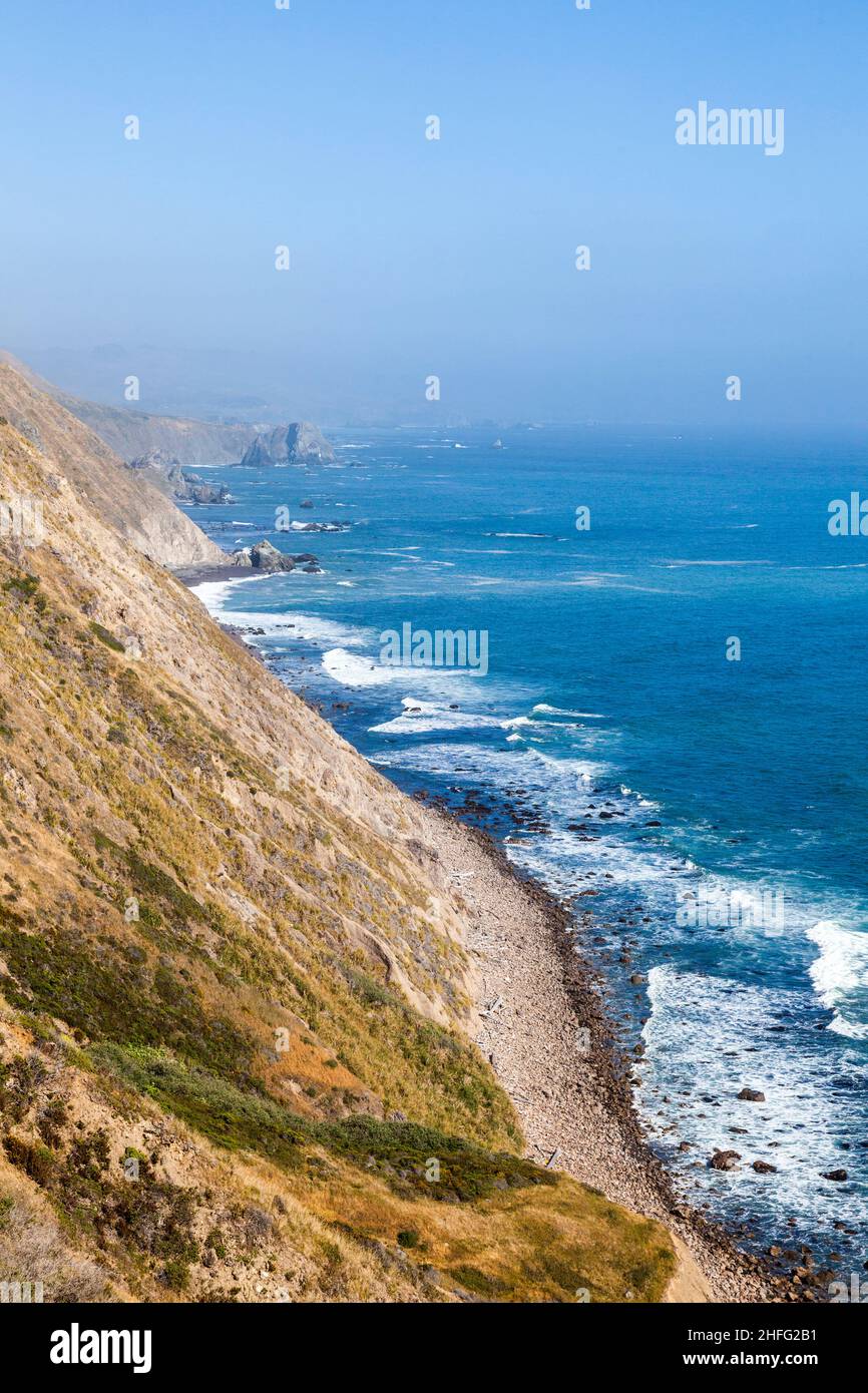 wild pacific coast with cliffs and huge waves Stock Photo - Alamy