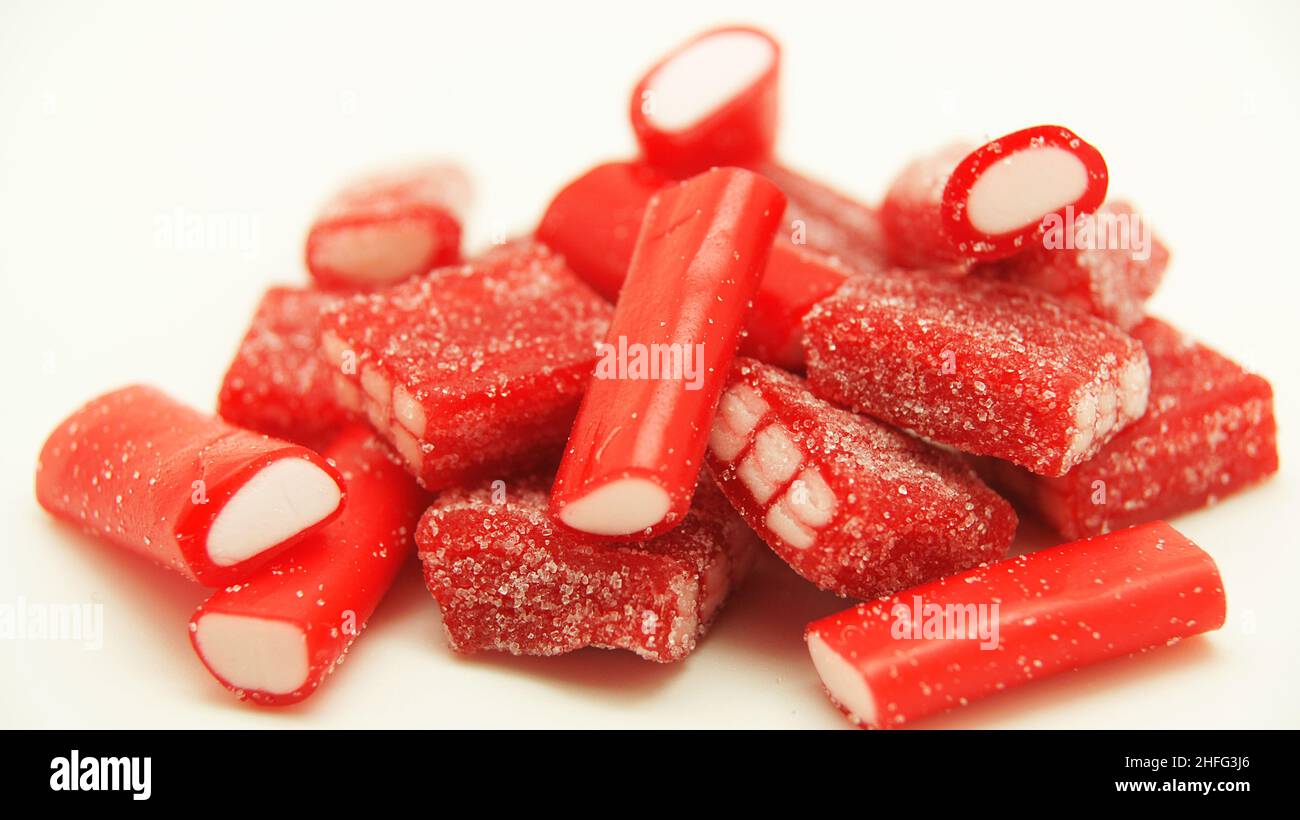 Candies in the form of bricks on white background Stock Photo - Alamy