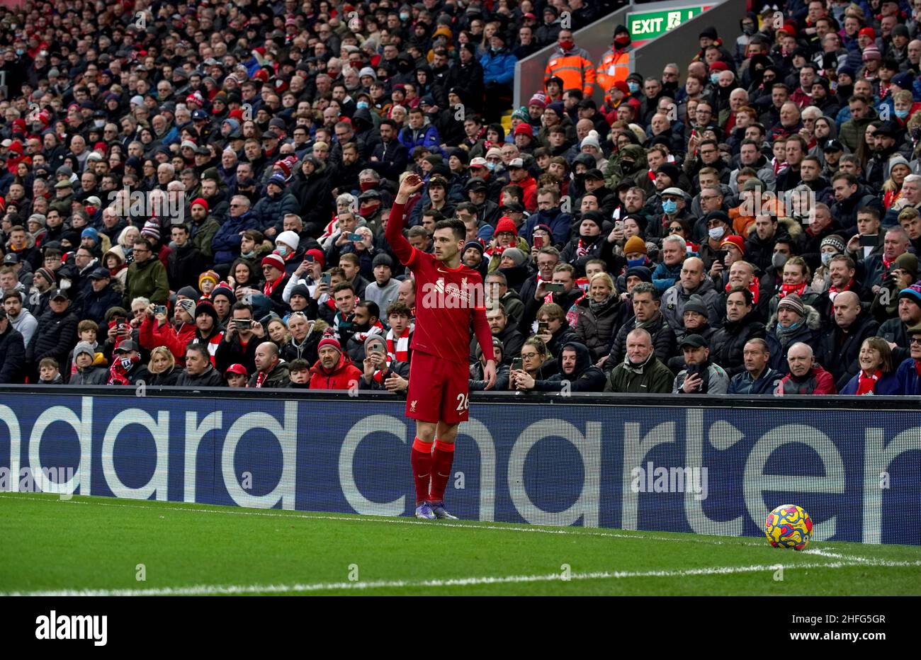Liverpool fans watch as Andrew Robertson takes a corner kick during the ...