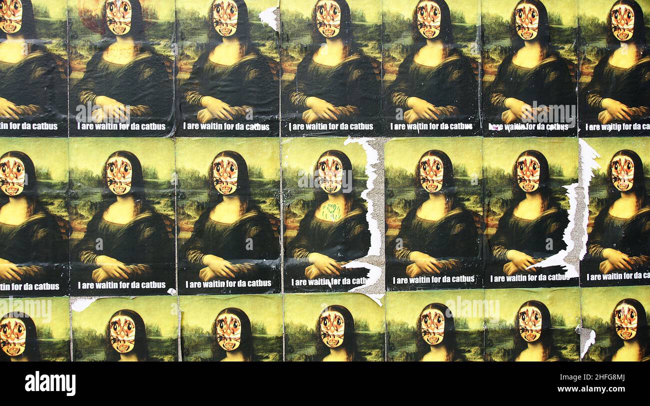 mosaic of advertising posters on a wall Stock Photo - Alamy