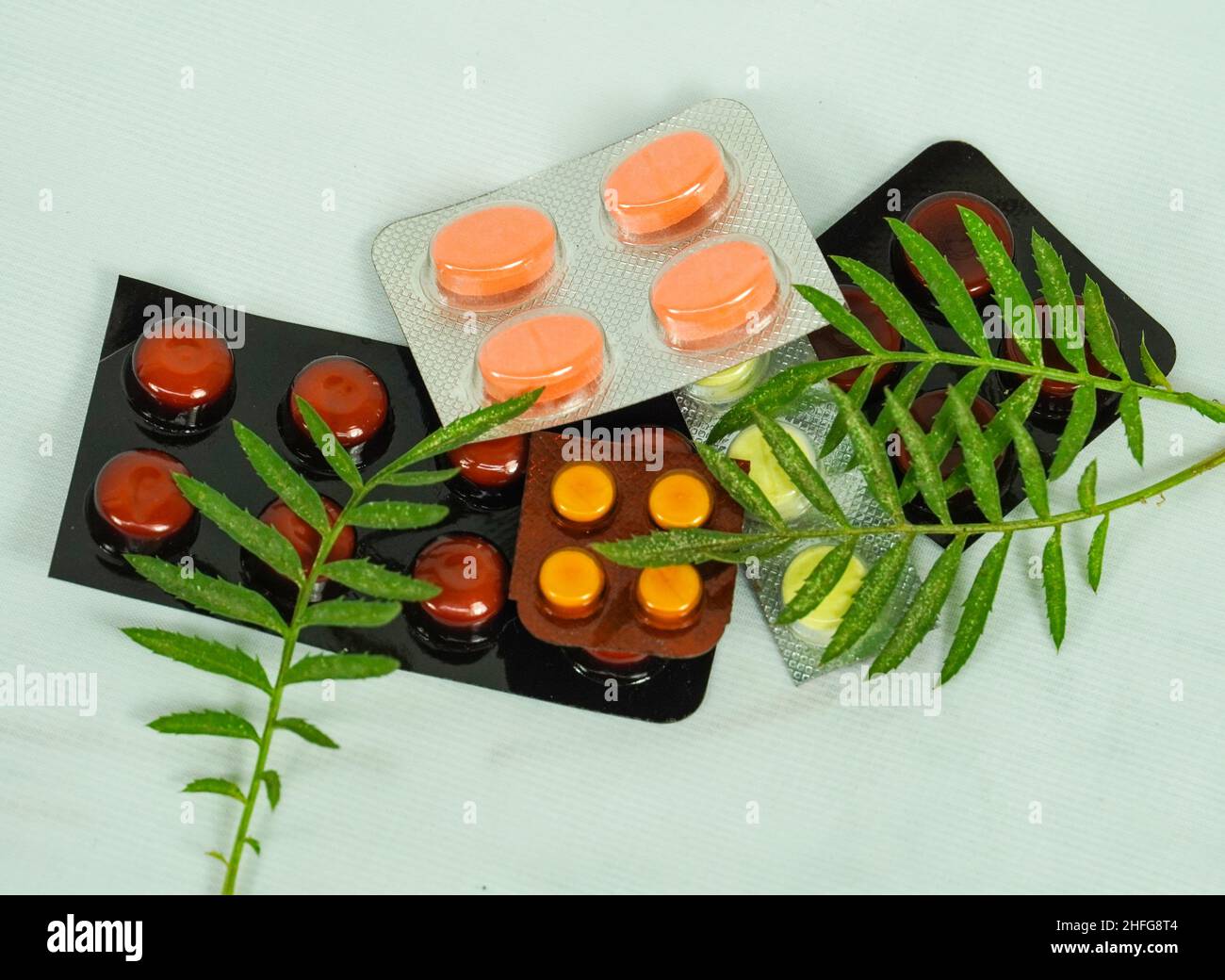 medicinal tablets with leaf nature symbol - medical concept Stock Photo ...