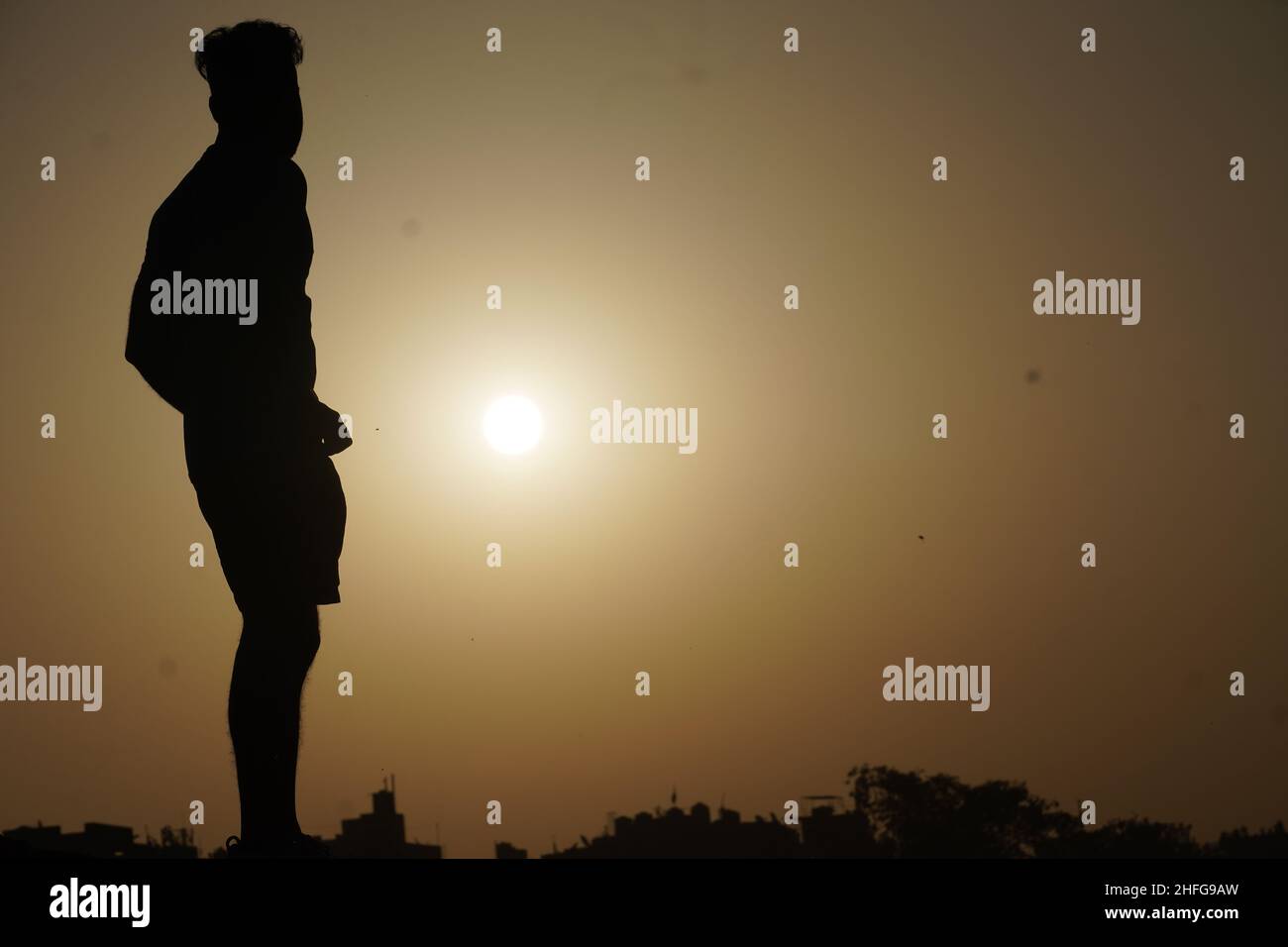 silhouette image of man with sun - motivational concept Stock Photo - Alamy