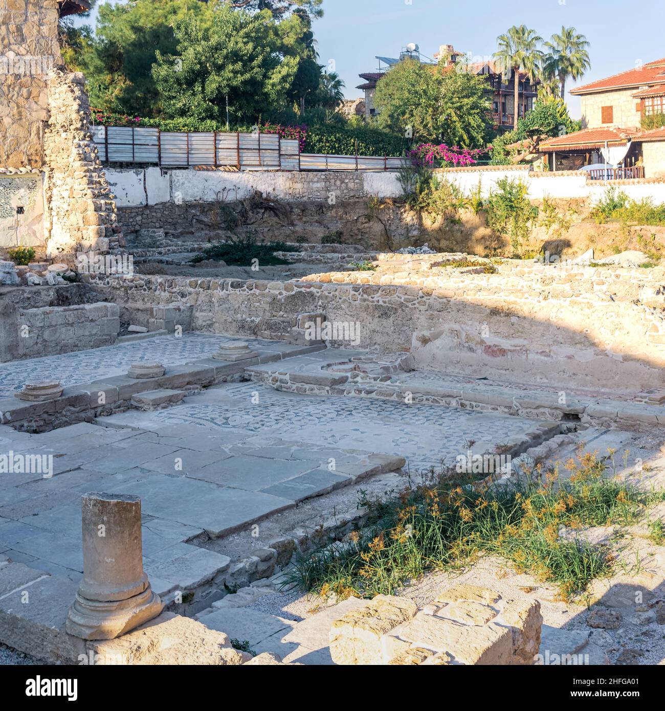 archaeological excavations of ancient Roman ruins among modern quarters ...