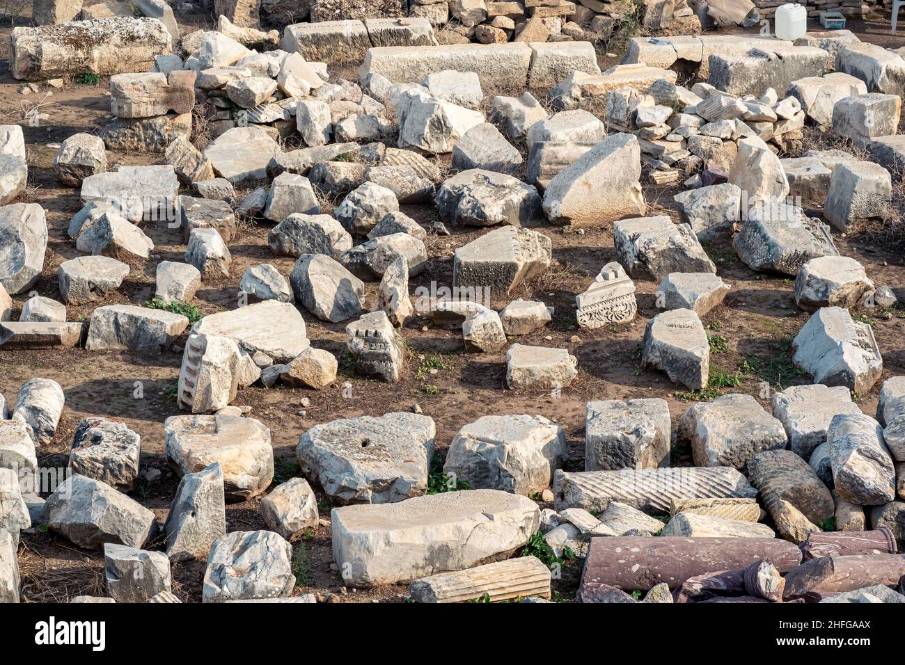 stones and fragments from ancient buildings at the archaeological site ...