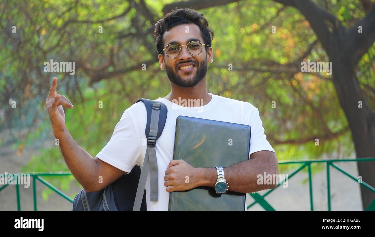 Smiling asian young Male with Laptop happy man image - online education ...