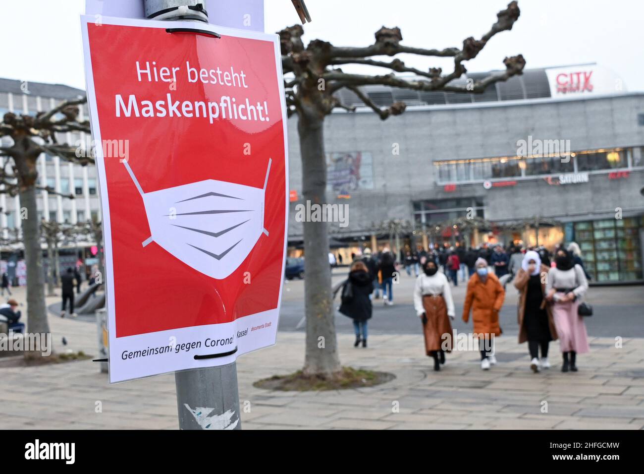Kassel, Germany. 15th Jan, 2022. A sign on Königsplatz warns people to ...