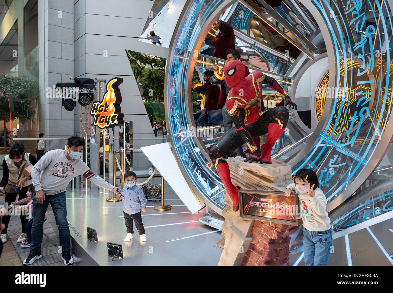 Hong Kong, China. 11th Dec, 2021. People are seen taking photos with ...