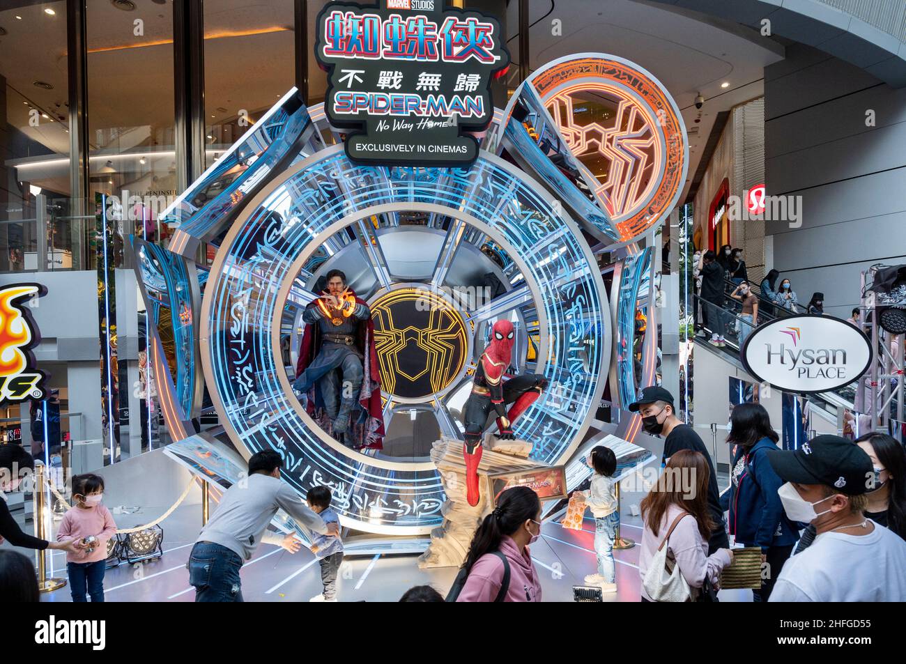 Hong Kong, China. 11th Dec, 2021. People are seen taking photos with ...