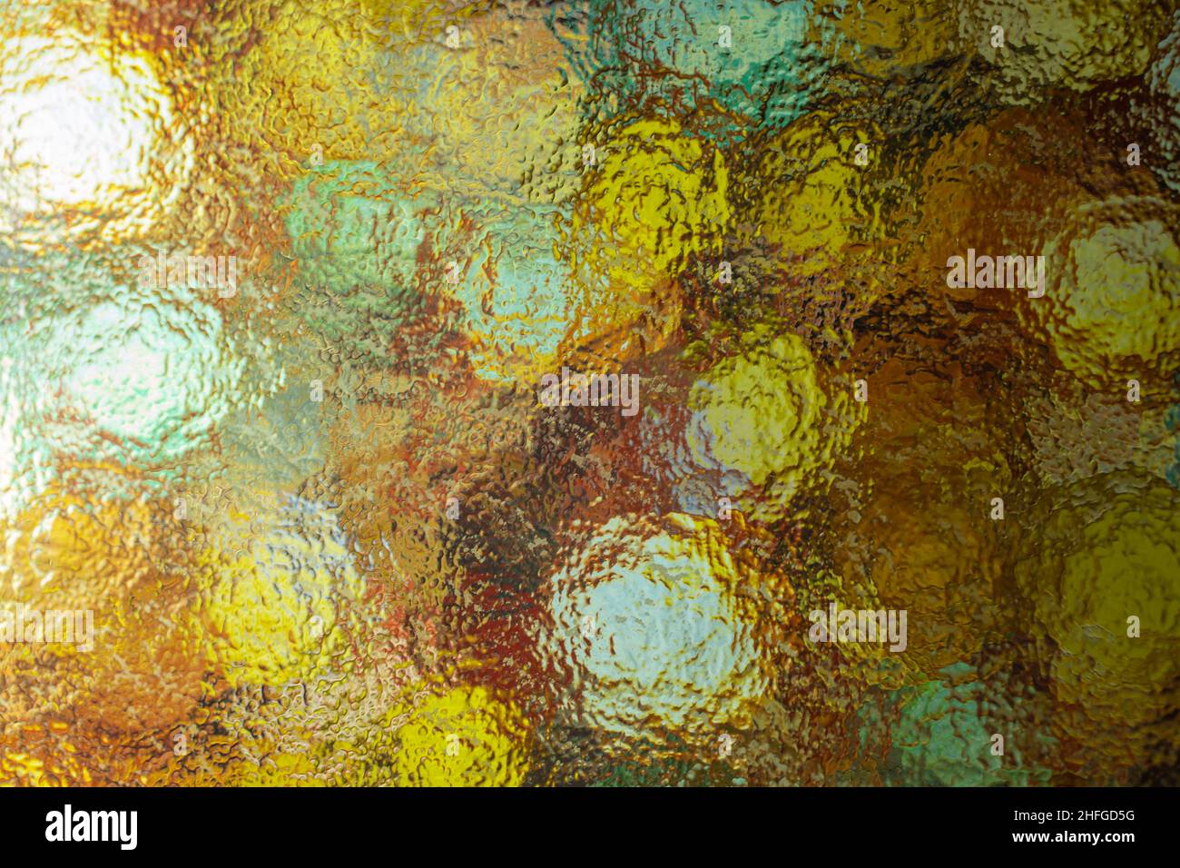 autumn colors seen thru textured glass Stock Photo - Alamy