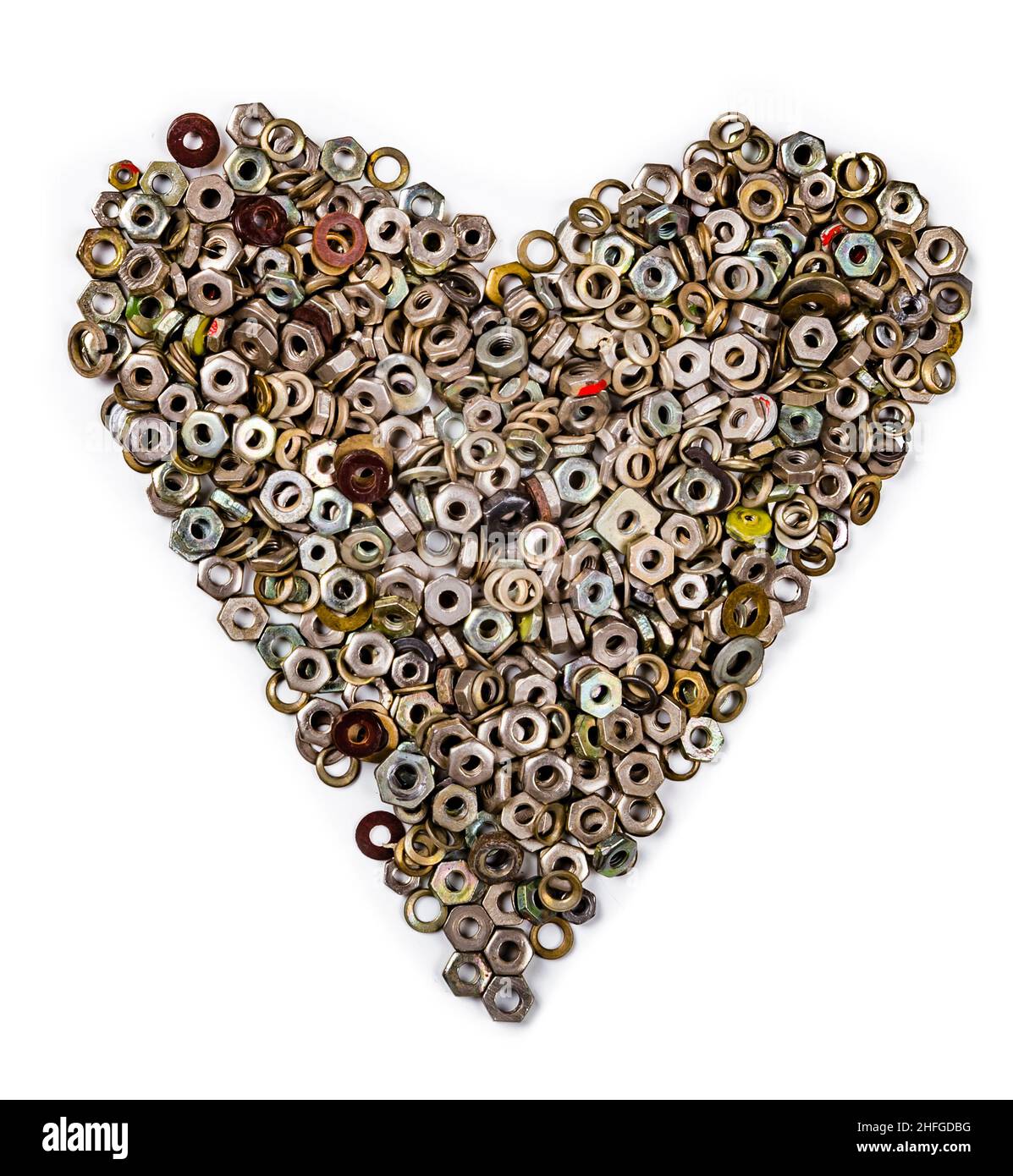 A heart shaped figure laid out from black screws isolated on white ...
