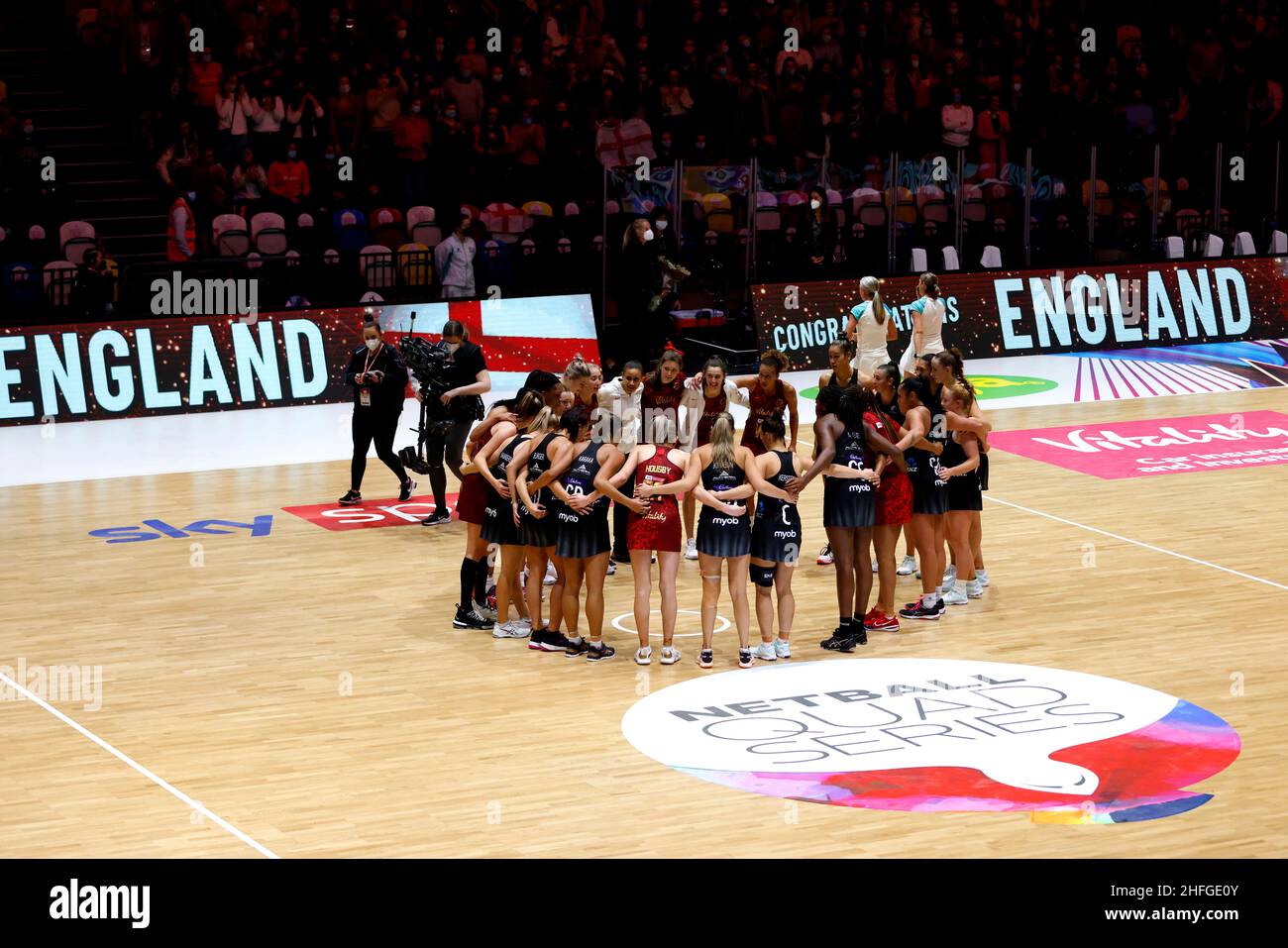 Both sides form a combined huddle after the netball quad series match ...
