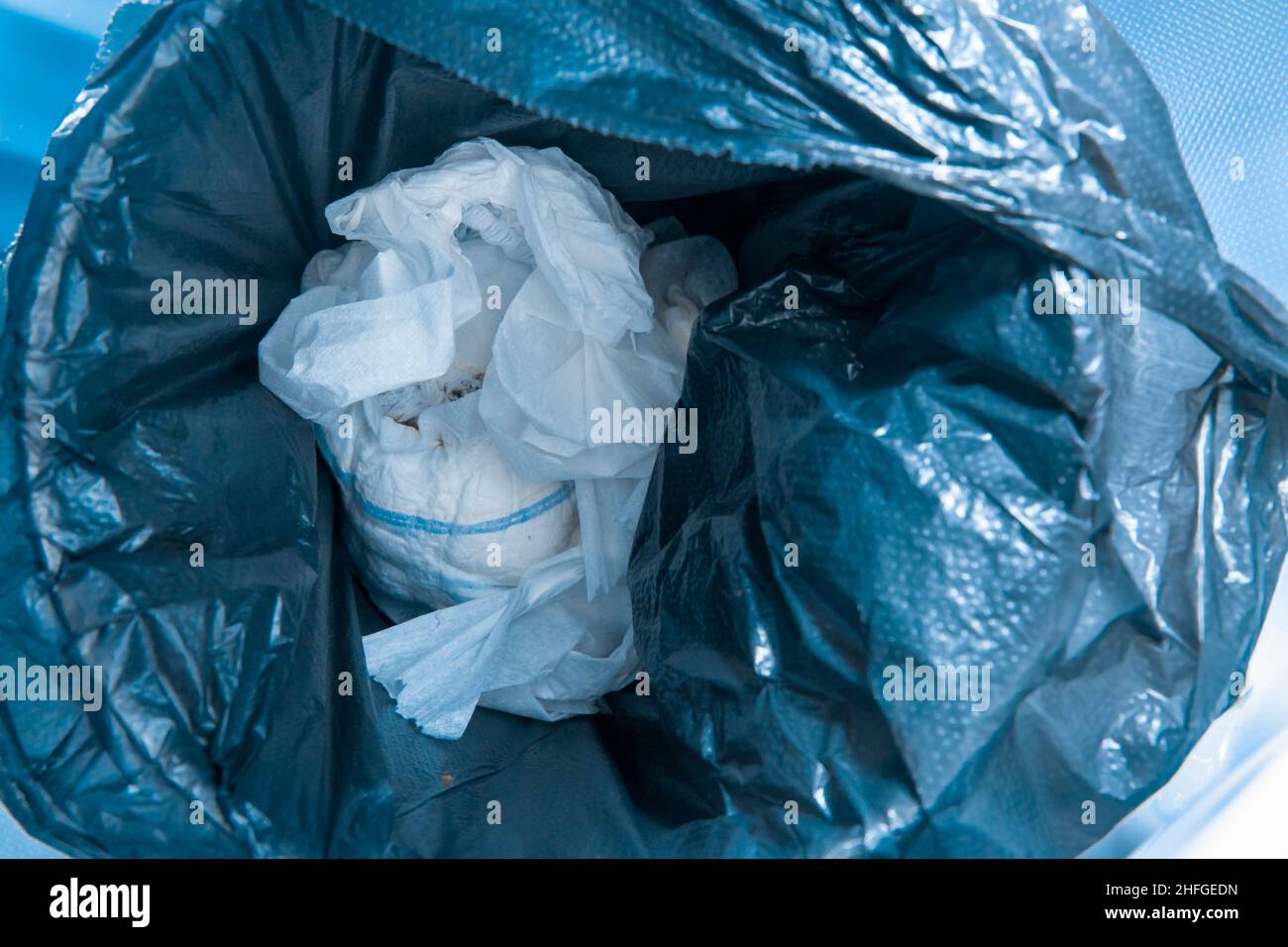 Waste used children's dirty diaper garbage in the trash bin Stock Photo ...