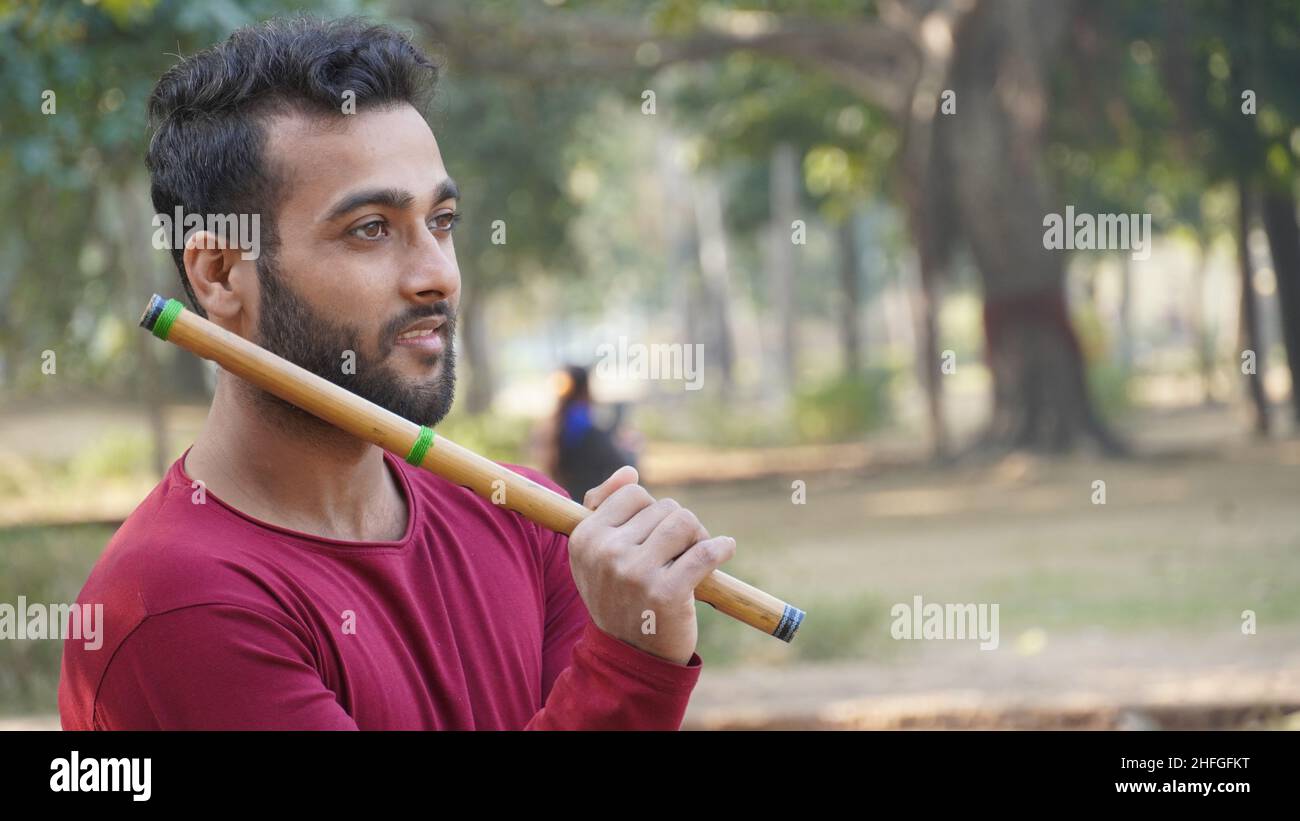 Blowing flute hi-res stock photography and images - Alamy