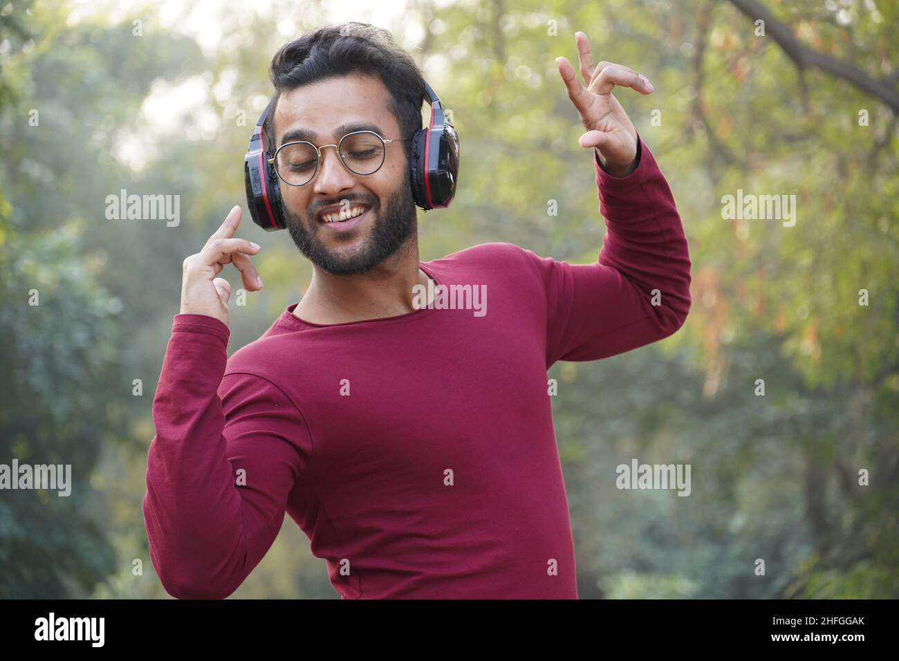 A smart boy listening a song Stock Photo - Alamy