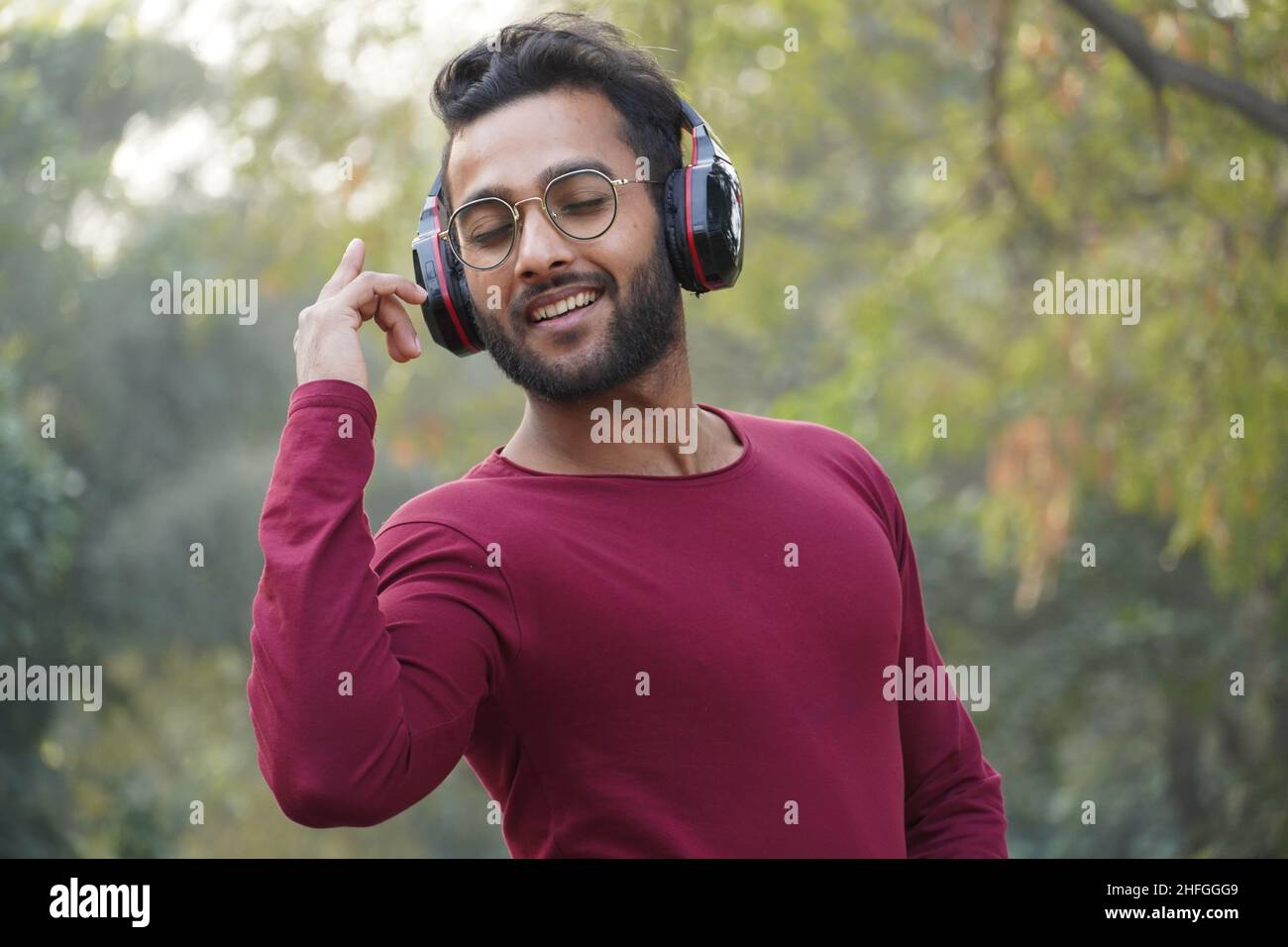 A smart boy listening a song Stock Photo - Alamy