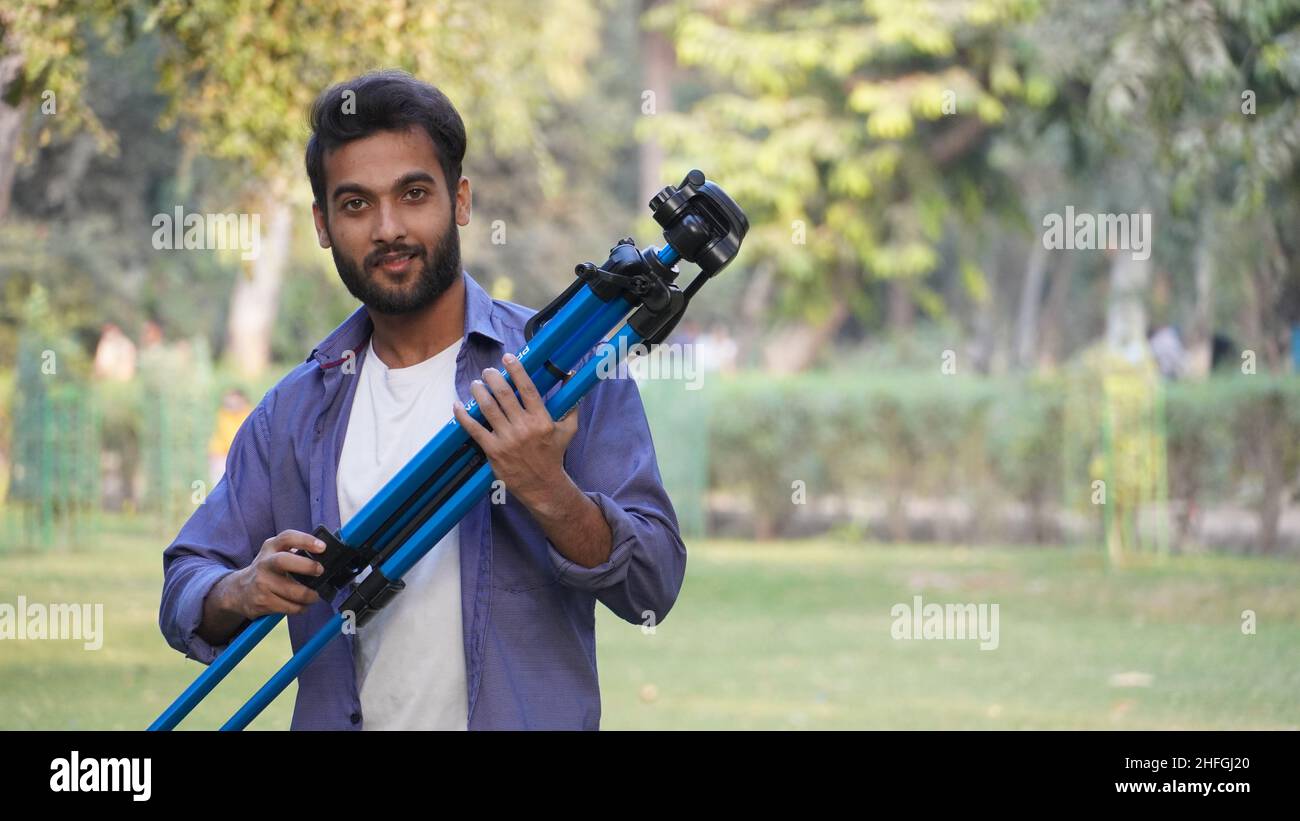 man standing with tripod - Blog images, Photography concept Stock Photo ...