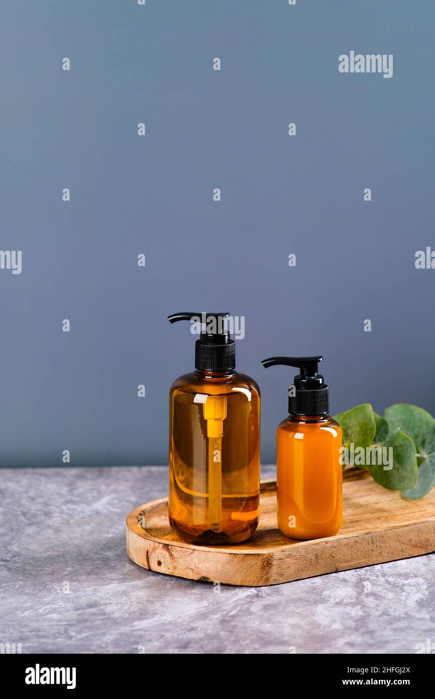 Set of natural organic SPA beauty products on wooden board with ...