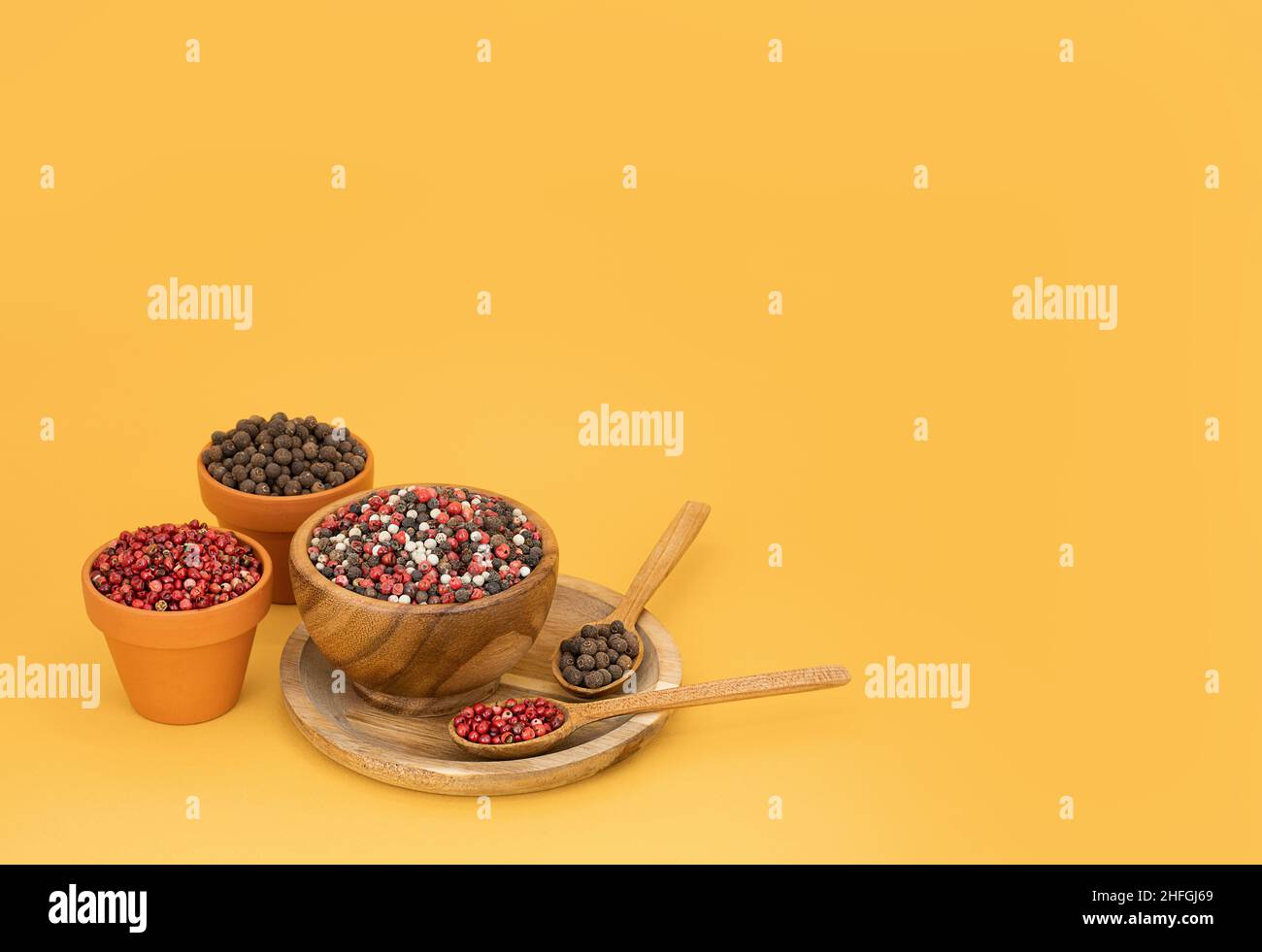 banner with copy paste of several types of peppers on a yellow ...