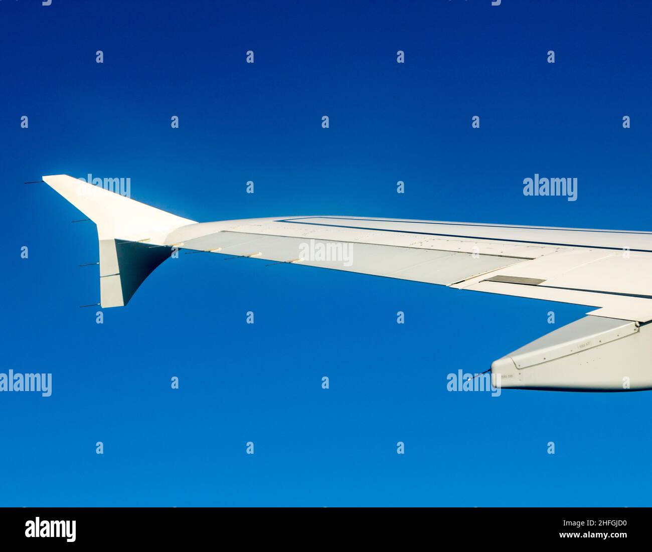 Aircraft wing some component of plane on during flying high above sky ...