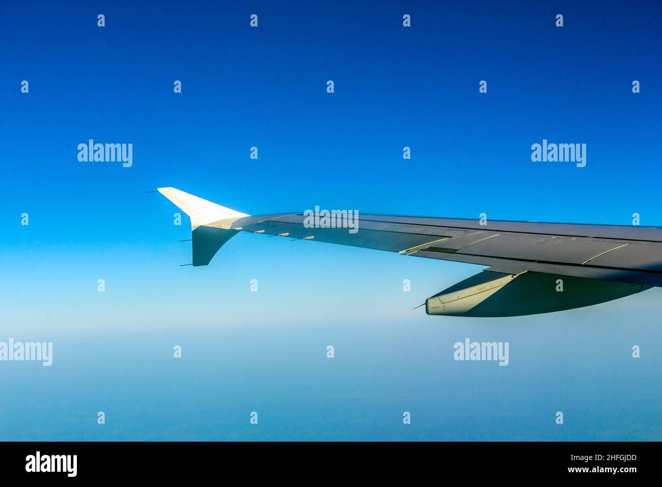 Aircraft wing some component of plane on during flying high above sky ...