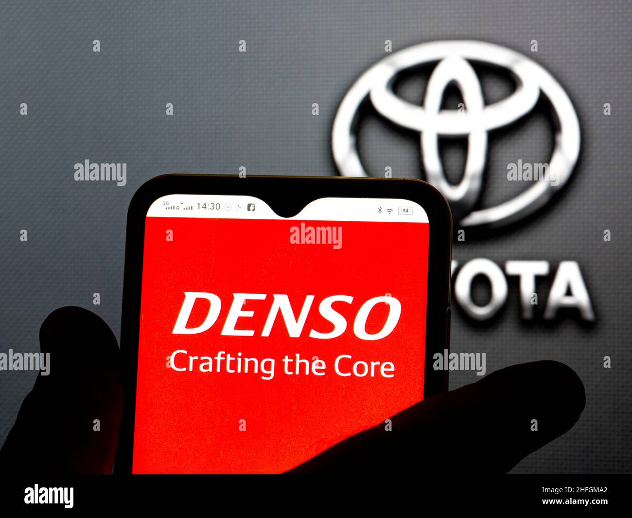 In this photo illustration, the Denso Corporation logo is seen ...