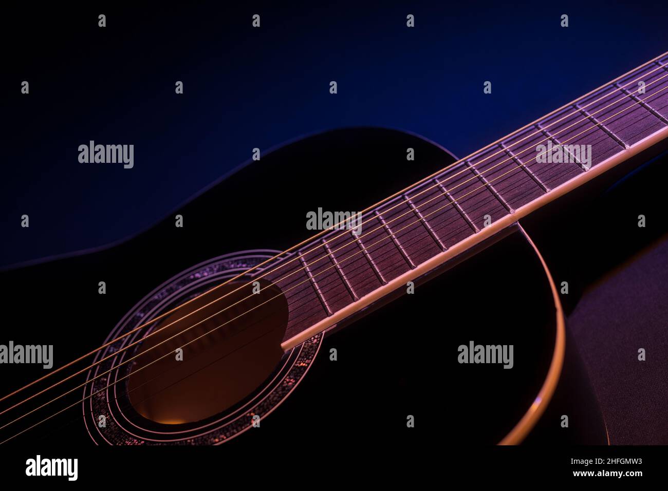 black guitar side view close-up. guitar music low-key concept Stock ...