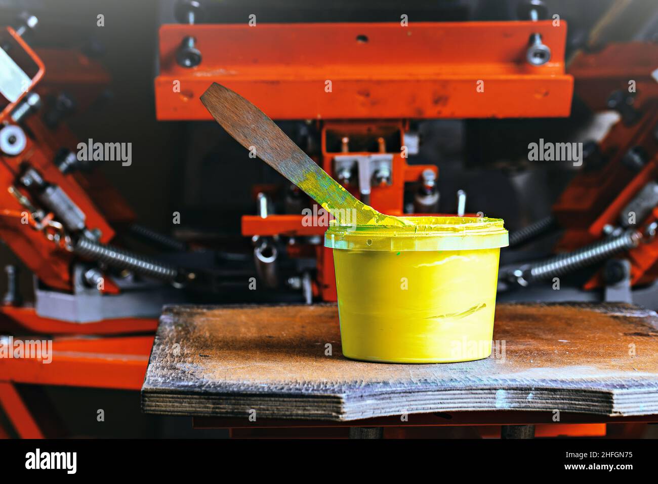 serigraph printing production. silk screen textile printery. can of ...