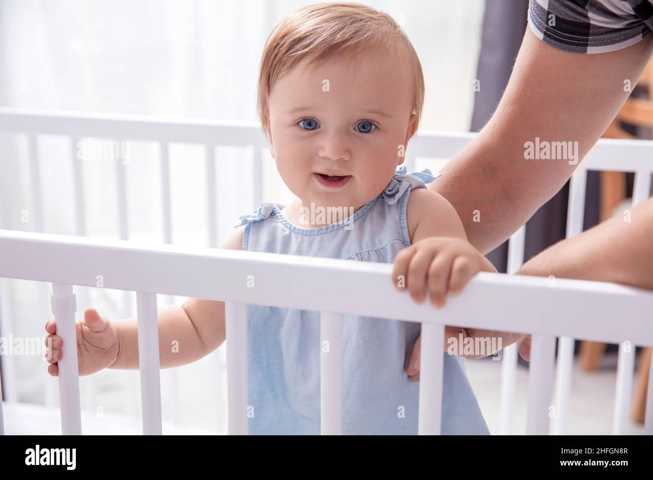 Baby stands hi-res stock photography and images - Alamy