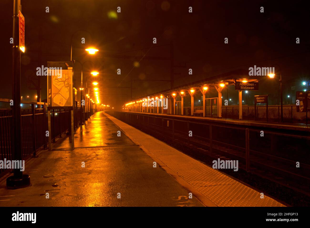 The train station in Matawan, New Jersey, on a wet and foggy late ...