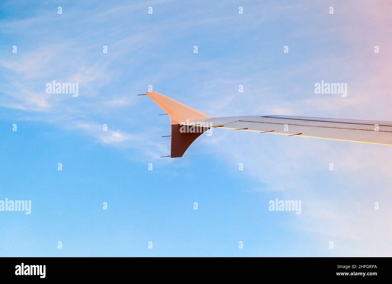 Aircraft wing some component of plane on during flying high above sky ...