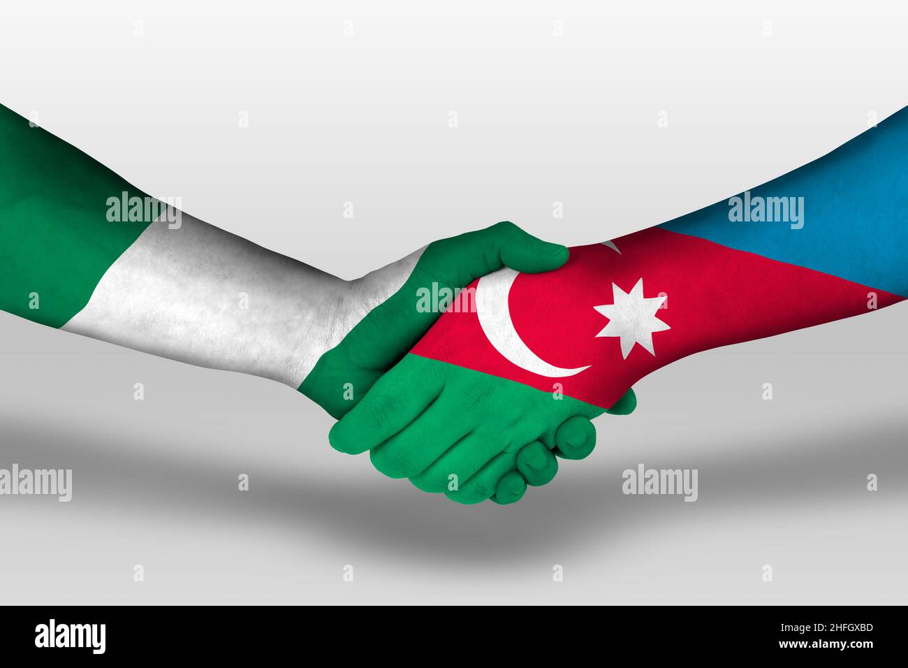 Handshake between argentina and nigeria flags painted on hands ...
