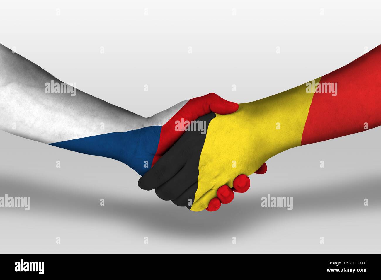 Handshake between austria and czech republic flags painted on hands ...