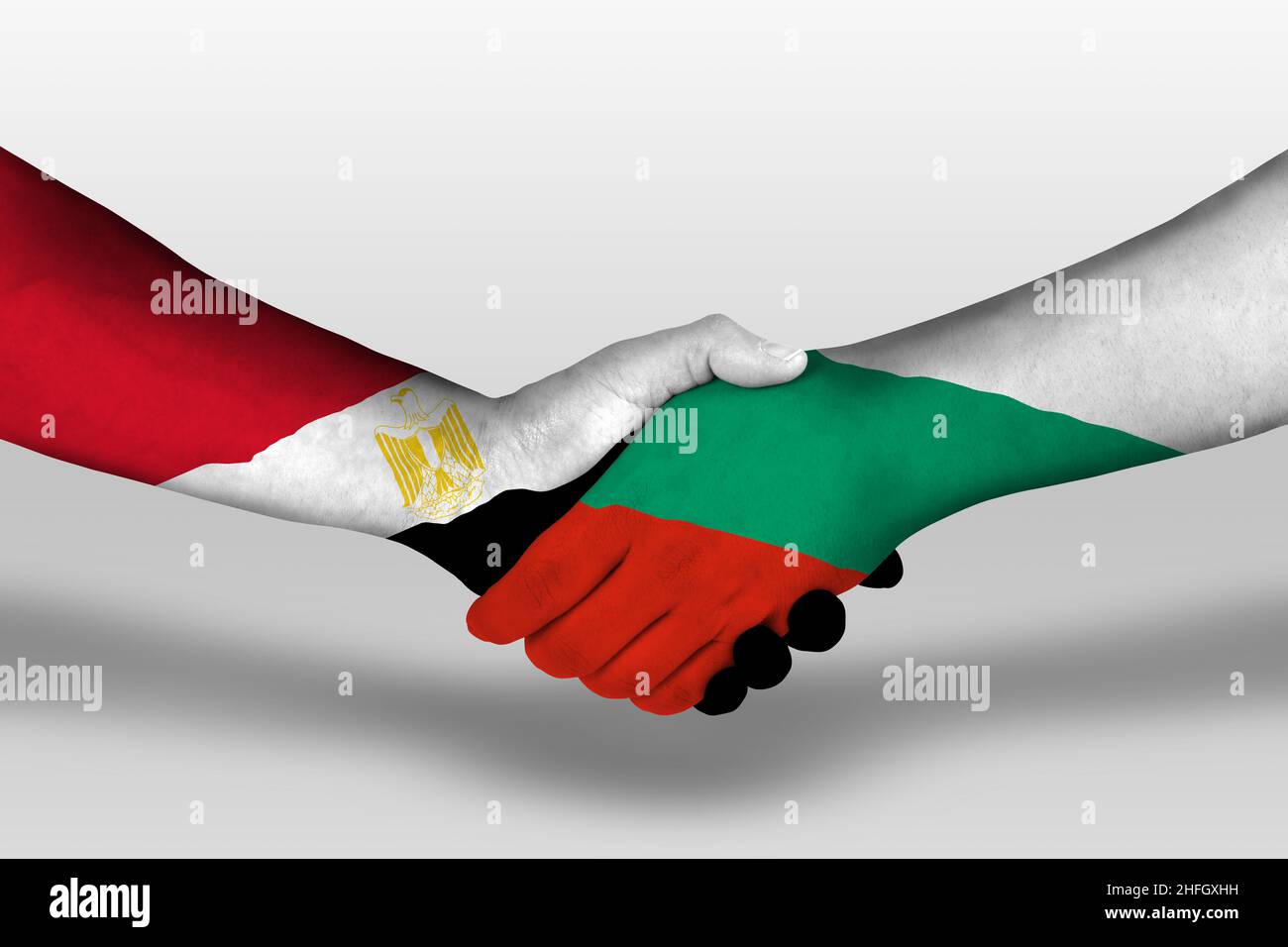 Handshake between azerbaijan and egypt flags painted on hands ...
