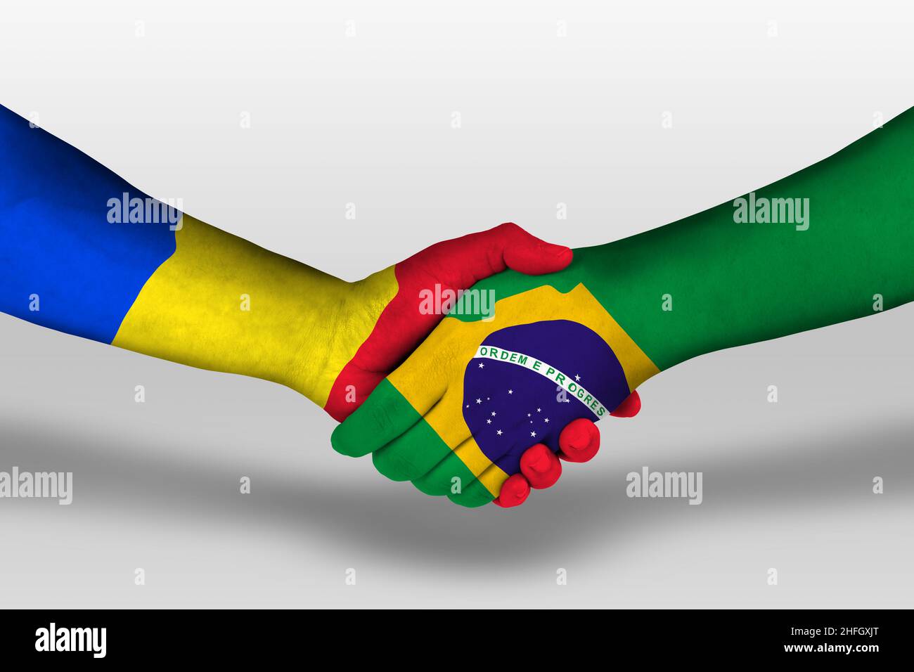 Handshake between azerbaijan and romania flags painted on hands ...