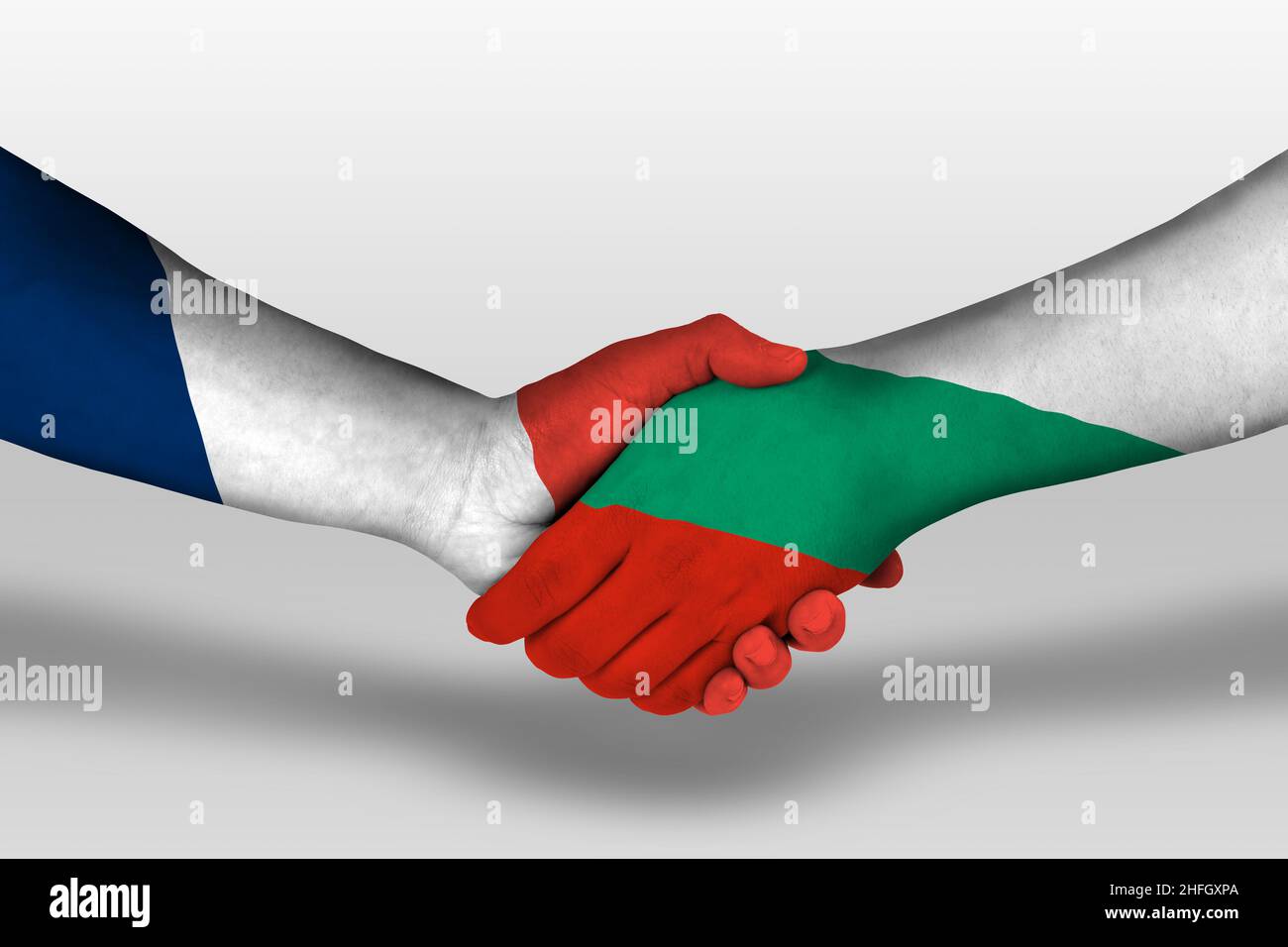 Handshake between brazil and france flags painted on hands ...