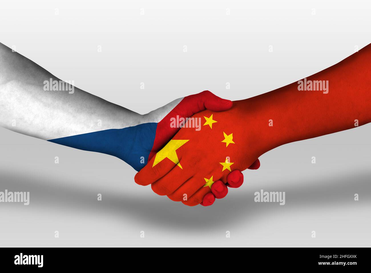 Handshake between canada and czech republic flags painted on hands ...