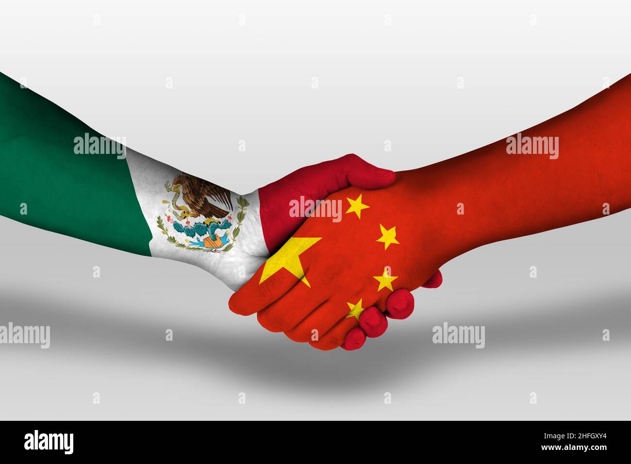 Handshake between canada and mexico flags painted on hands ...