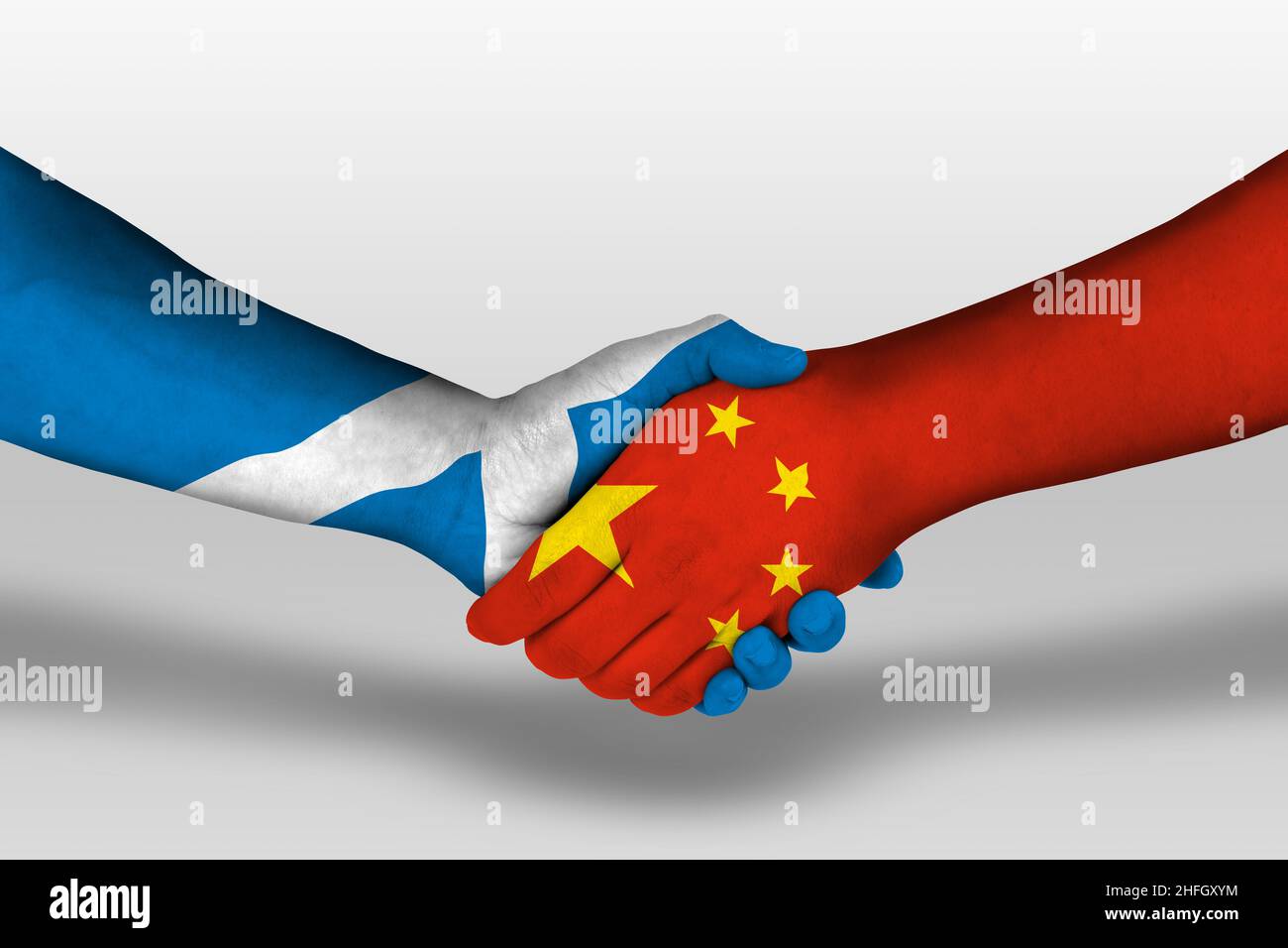 Handshake between canada and scotland flags painted on hands ...