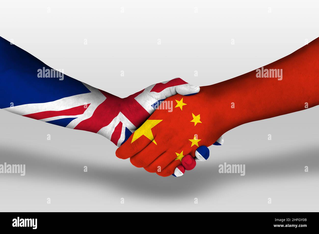Handshake between canada and united kingdom flags painted on hands ...