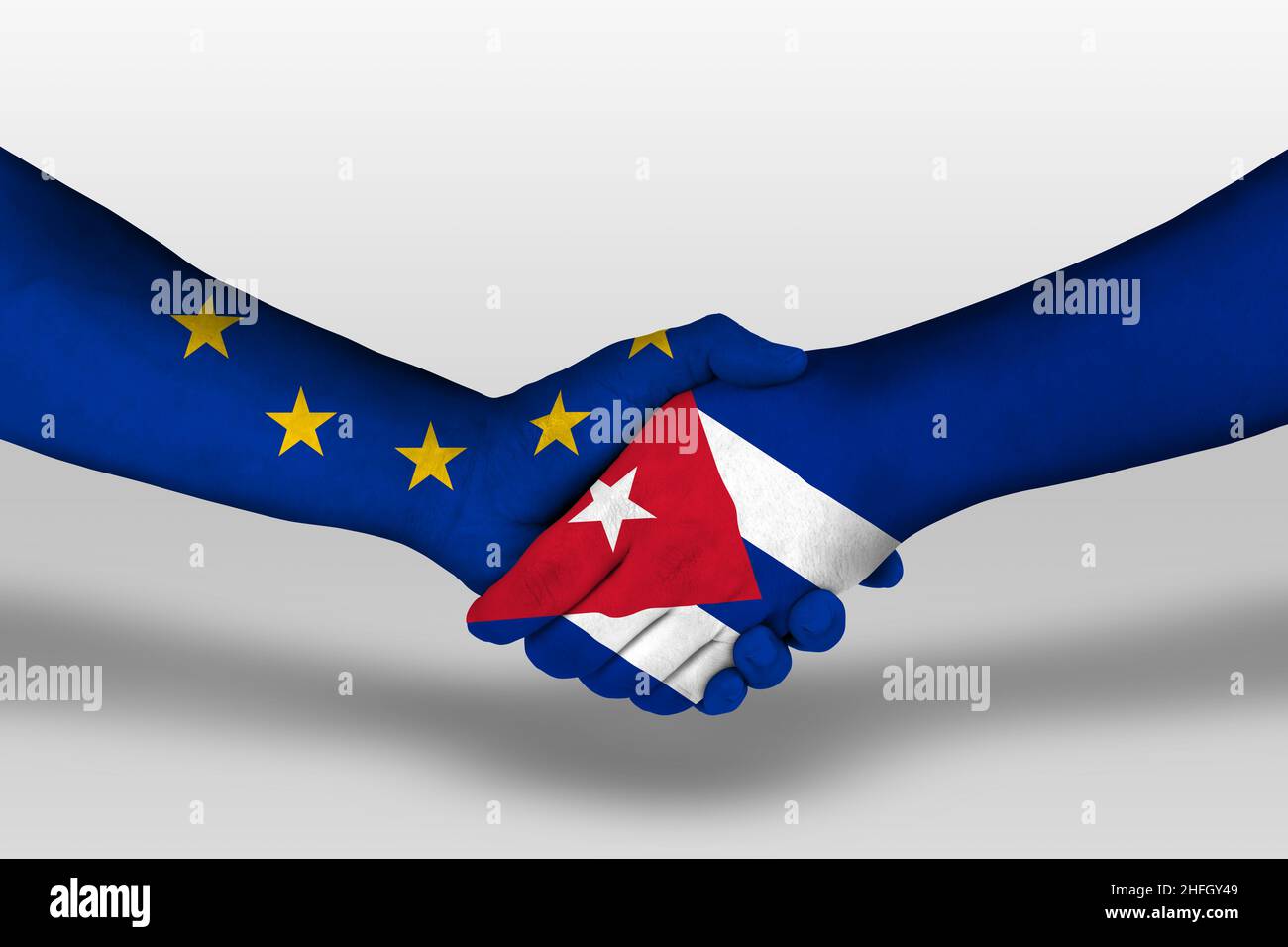 Handshake between columbia and european union flags painted on hands ...