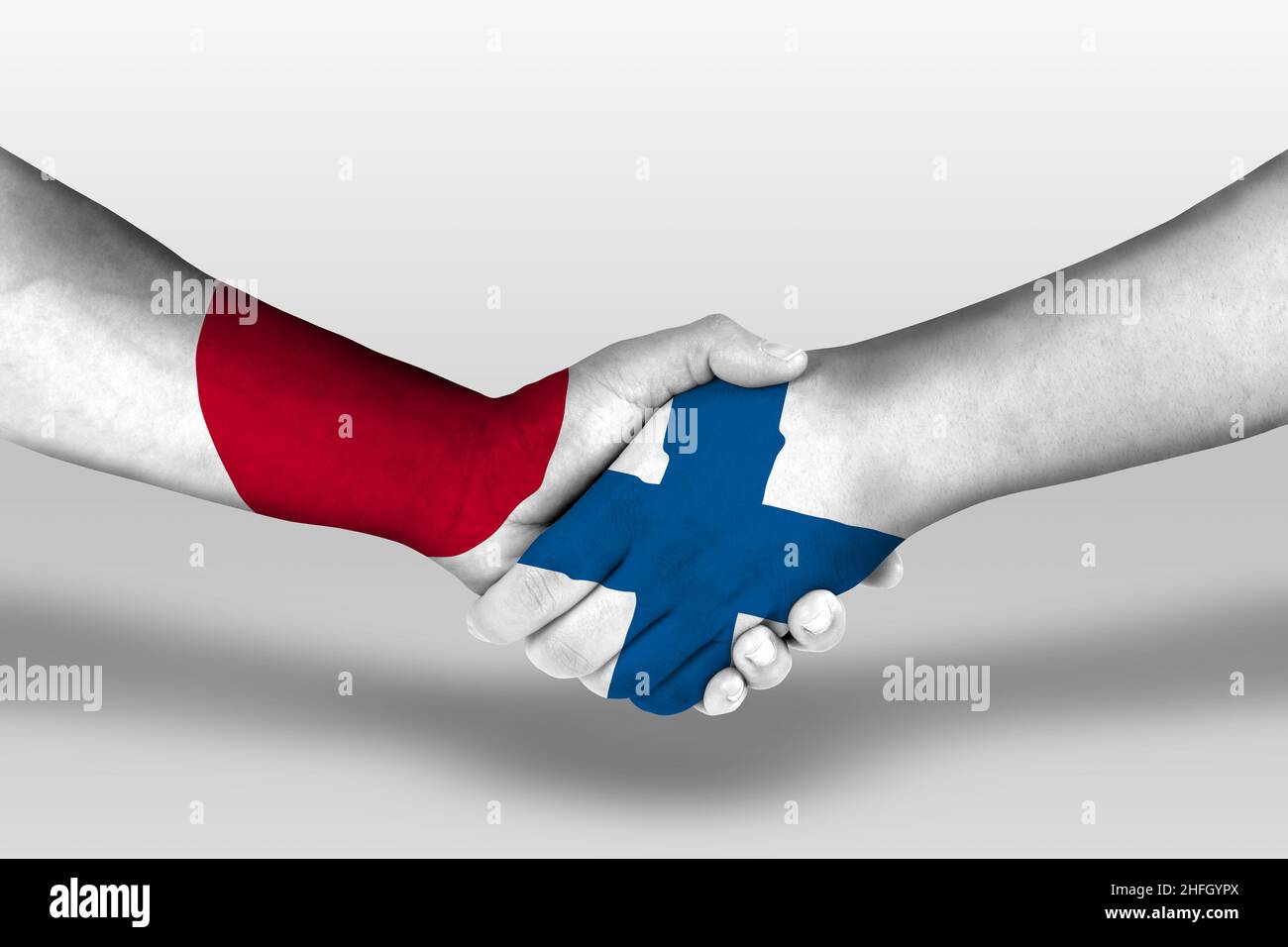 Handshake between england and japan flags painted on hands ...