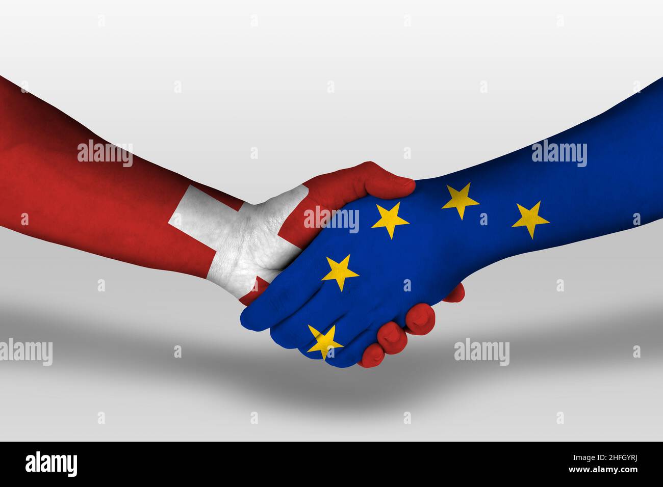 Handshake between england and switzerland flags painted on hands ...