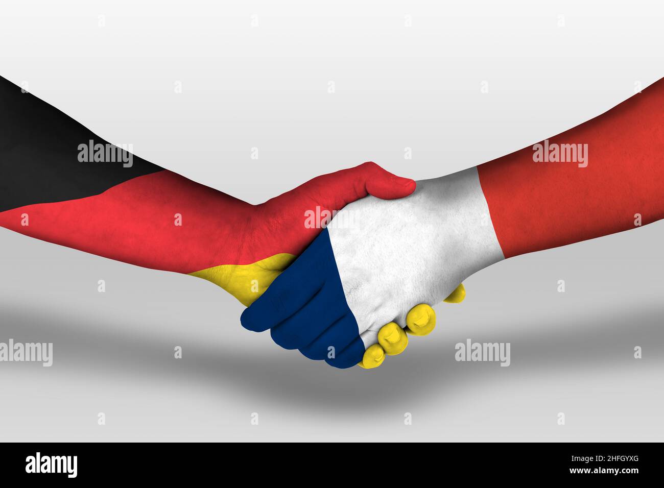 Handshake between european union and germany flags painted on hands ...