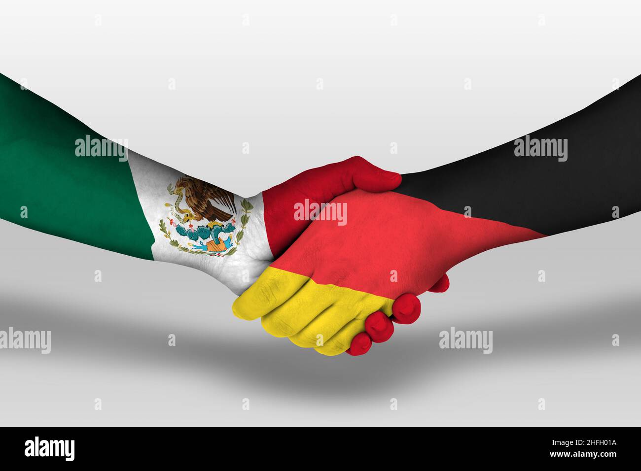 Handshake between finland and mexico flags painted on hands ...